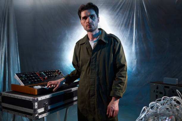 Free Stock Photo of Man Standing Next to Keyboard on Stage | Download ...