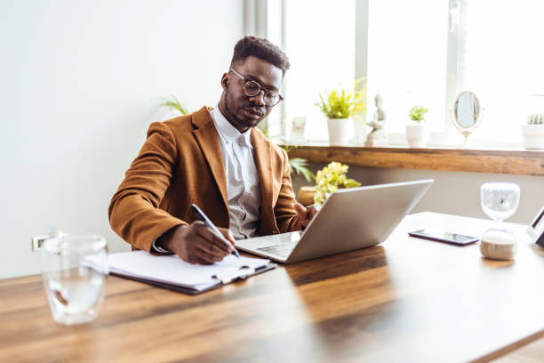 Free Stock Photo of Man working hard at desk in home office | Download ...