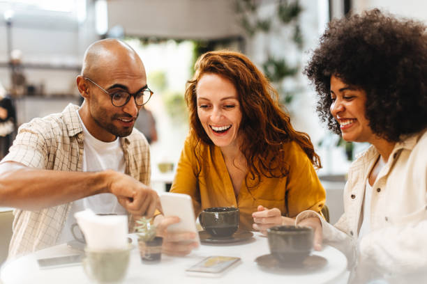 Free Stock Photo of Group of People Sitting at a Coffee Shop Table ...