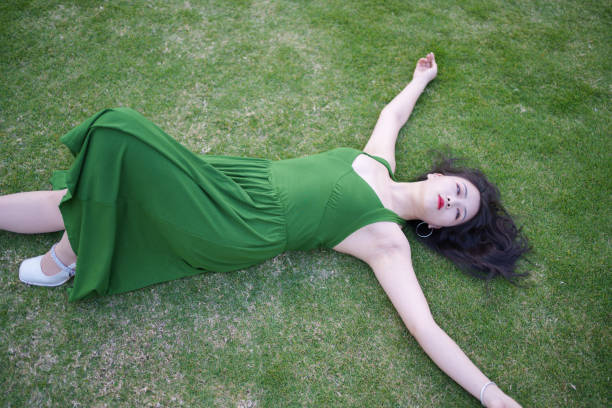 Free Stock Photo of Vintage pin-up style woman lying on grass ...