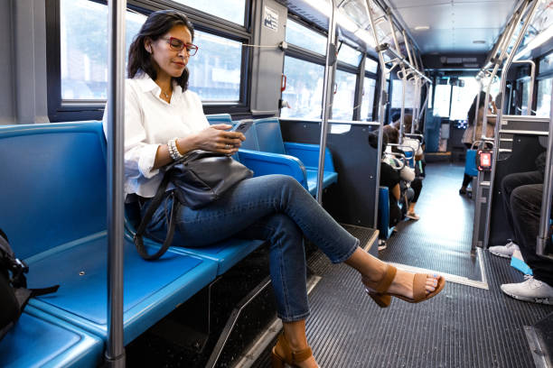 Free Stock Photo of Woman Sitting on Blue Bus With Legs Crossed ...