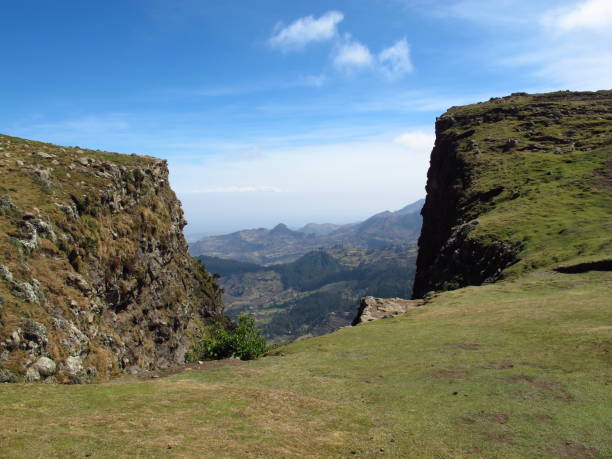 Free picture: A high cliffs surrounding green valley at bright sunlight ...