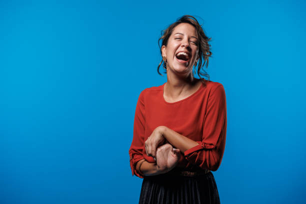 Free picture: Portrait of a cheerfully smiling young woman in a field ...
