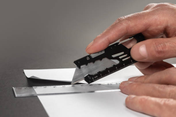 Free Stock Photo of Person Cutting Piece of Paper With Knife | Download ...