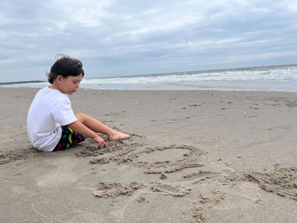 Free Stock Photo of Person Writing in Sand on Beach | Download Free ...
