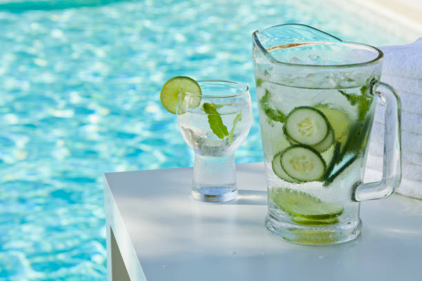 Free Stock Photo of Poolside refreshment with drink and water bottle ...
