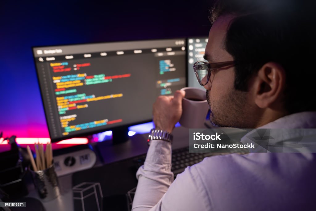 Smart It Developer Drinking Coffee Cup While Working Code On Pc Screen