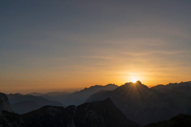 Free Stock Photo of Sun Setting Over Mountain in Distance | Download ...