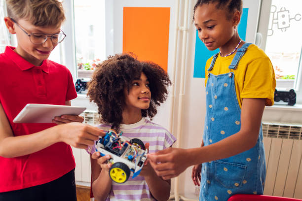 Free Stock Photo of Students learning in a robotics lab, working in ...