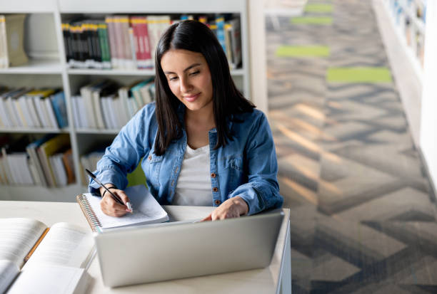 Free Stock Photo of Woman in the library writing | Download Free Images ...