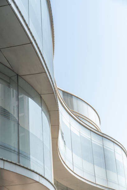 Free Stock Photo of Curved modern building with sleek glass windows ...