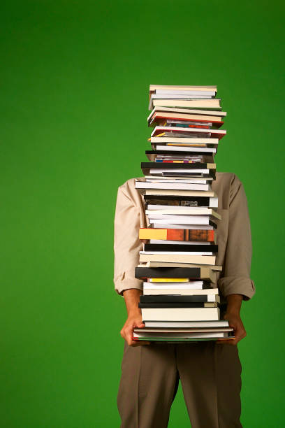 Free Stock Photo of Person Holding a Stack of Books | Download Free ...