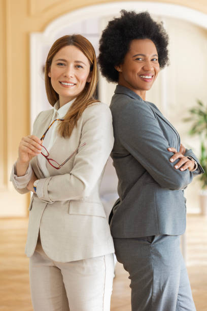 Free Stock Photo of Two Women Standing Beside Each Other in a Church ...