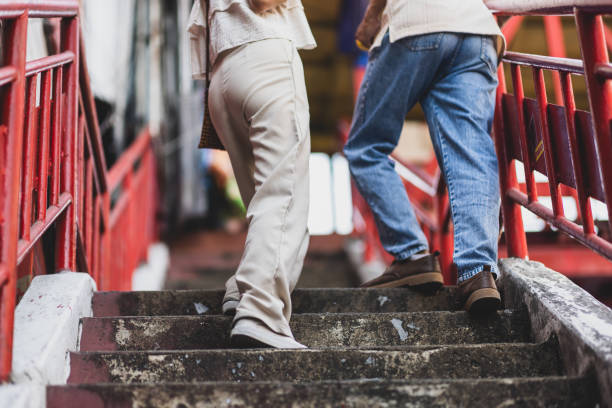 Free Stock Photo of Person Walking Up Stairs With Orange Shoes ...