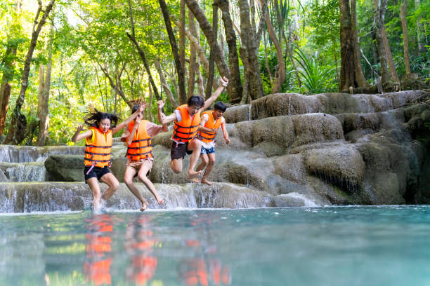 Free Stock Photo of Friends at a tropical waterfall adventure ...