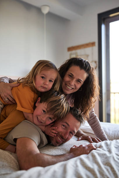 Free Stock Photo of Family cuddling in bed together | Download Free ...