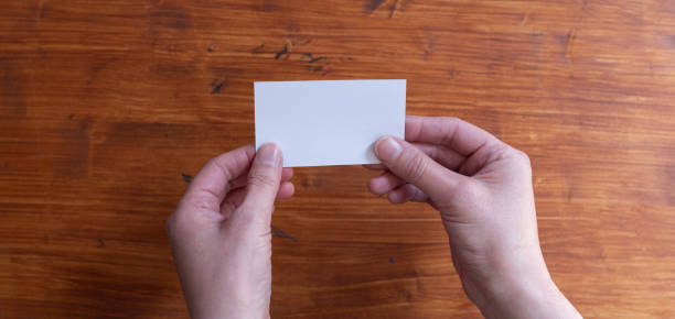 Free Stock Photo of Person Holding Card in Front of Face | Download ...