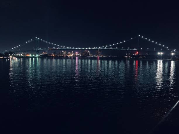 Free Stock Photo of Large Bridge Illuminated Over Water at Night ...