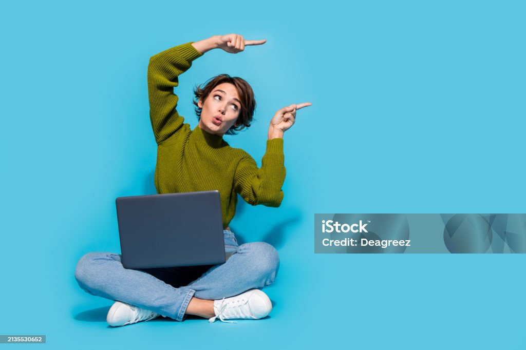 Photo Of Cute Adorable Girl Sit Floor Wear Trendy Clothes Arms Above Head Look Empty Space