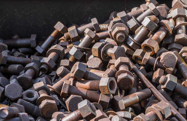 Free Stock Photo of A collection of bolts forms a direction screw ...