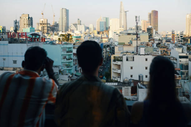 Free Stock Photo of Man enjoying the view of a cityscape from a high ...