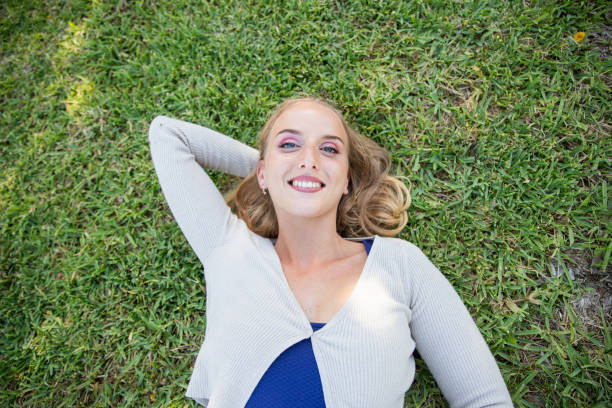 Free Stock Photo of Woman Laying on the Ground Looking Up | Download ...