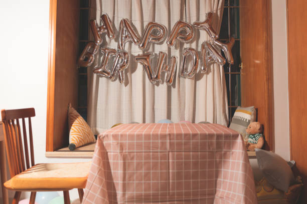 Free picture: A Happy Birthday sign hangs on a red curtain above an ...