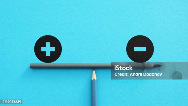 Plus And Minus Or Positive And Negative Symbols Are In Balance On A