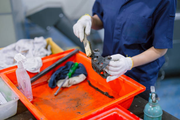 Free Stock Photo of Mechanic cleaning up car parts | Download Free ...