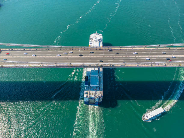 Free Stock Photo of Large Ship Passing Under Bridge | Download Free ...