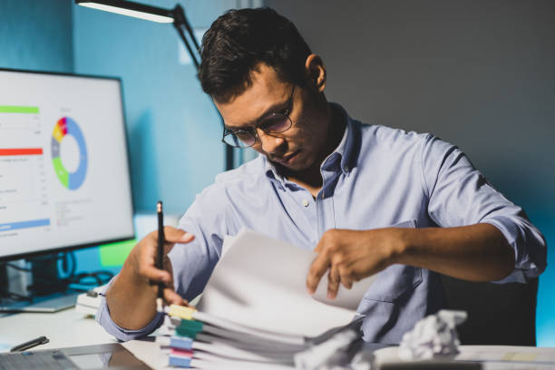 Free Stock Photo of Man working hard at desk in home office | Download ...