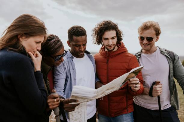 Free Stock Photo of A group of people looking at a map | Download Free ...