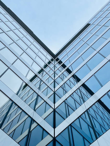 Free Stock Photo of Reflective glass facade of a skyscraper showcasing ...