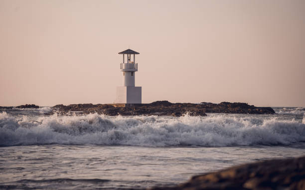 Free picture: Waves splashing on majestic white lighthouse at dark night