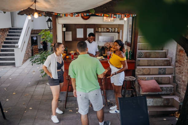 Free Stock Photo of Group of People Standing Around a Bar | Download ...