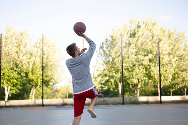 Free Stock Photo of A young man shooting a basketball | Download Free ...