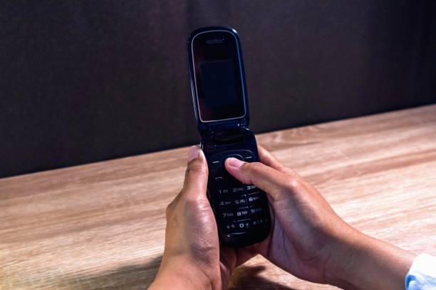 Free Stock Photo of Vintage flip mobile phone held in hand | Download ...
