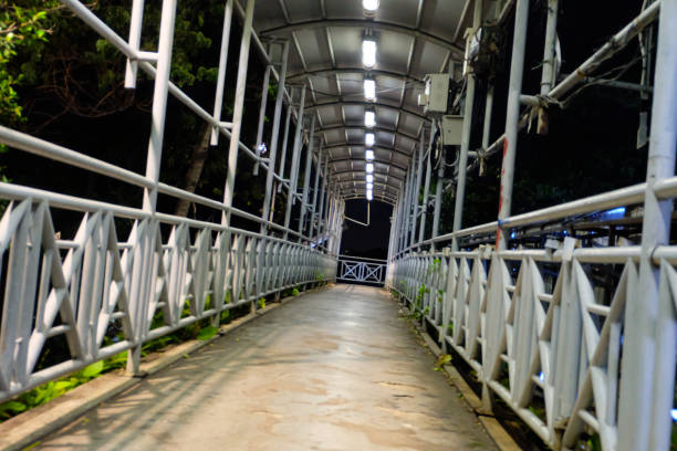 Free Stock Photo of Illuminated pedestrian bridge captured in night ...