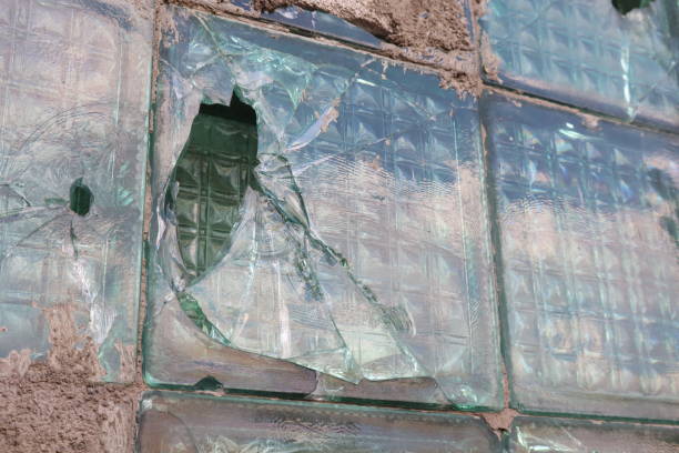 Free picture: Broken glass block, hole in the glass block wall