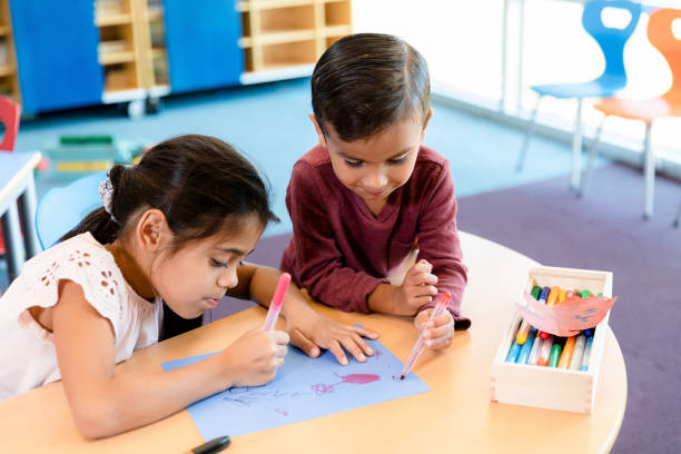 Free Stock Photo of Two children drawing together | Download Free ...