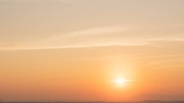 Free picture: Hazy orange yellow sky at dusk with the sun setting ...