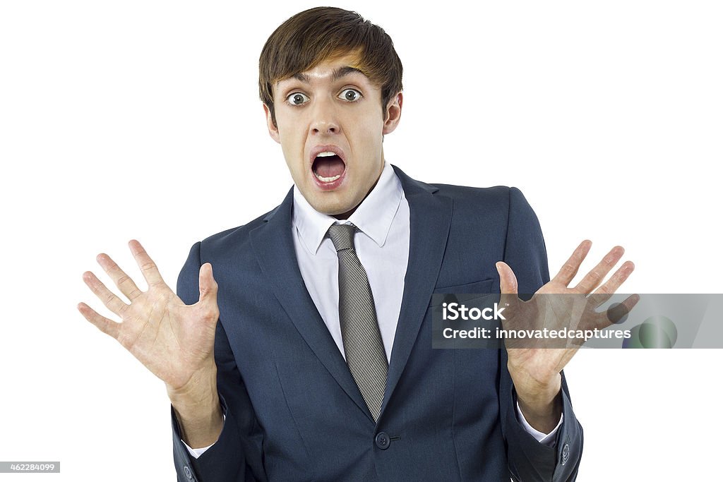 Mocking Gesture By A Caucasian Businessman On A White Background Stock