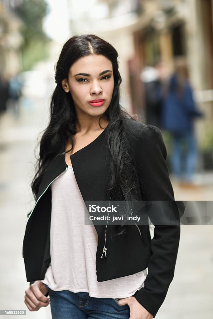 Hispanic Young Woman Wearing Casual Clothes In Urban Background Stock