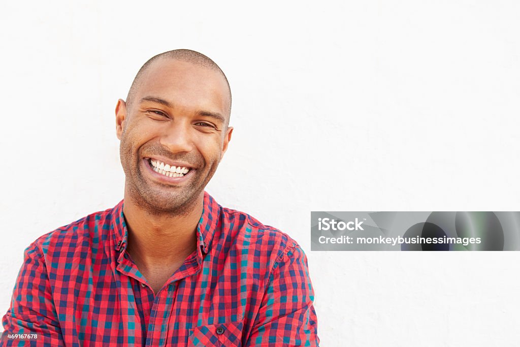Portrait Of Man Standing Outdoors Against White Wall Stock Photo ... Portrait Of Man Standing Outdoors Against White Wall Stock Photo ...