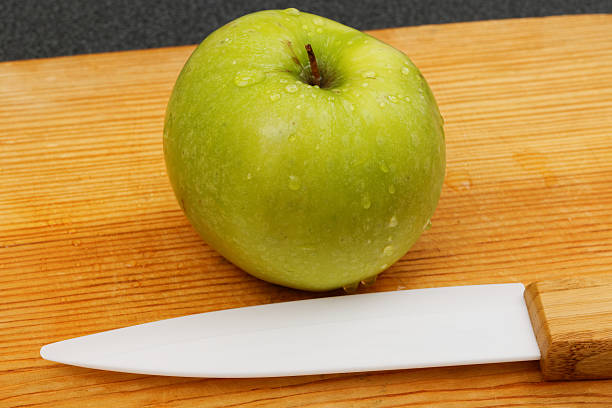 Free Stock Photo of Green Apple Impaled by Knife | Download Free Images ...