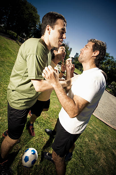 Free Stock Photo of Soccer players pushing each other for a ball ...