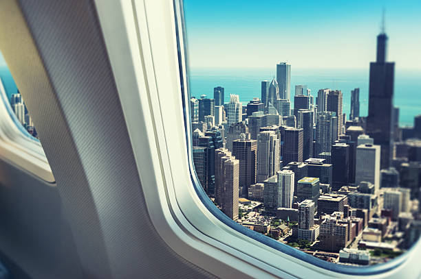 Airplane above Chicago – free photo on Barnimages