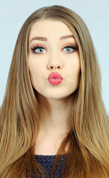 160 Beautiful Flirtatious Woman Blowing Kiss At Camera Flowing Hair