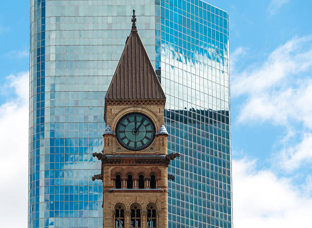 Free Stock Photo of Historic clock tower amidst modern buildings ...