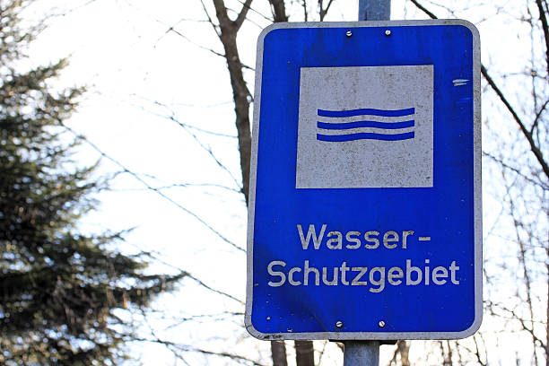 Free Stock Photo of Blue Sign by Body of Water | Download Free Images ...